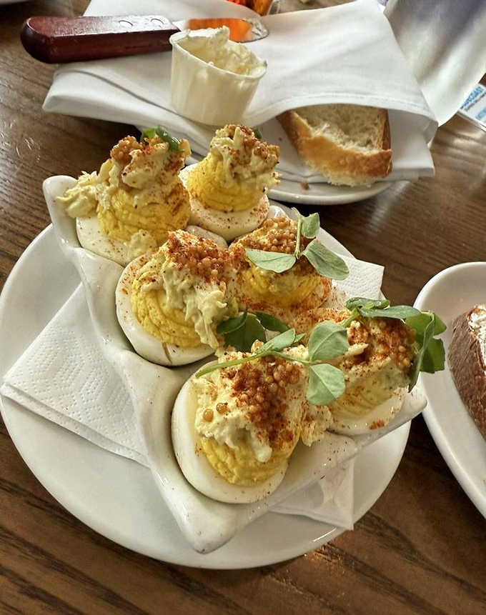 Deviled eggs that have clearly been to finishing school&mdash;creamy, perfectly piped, and dressed with herbs that make them ready for their close-up.