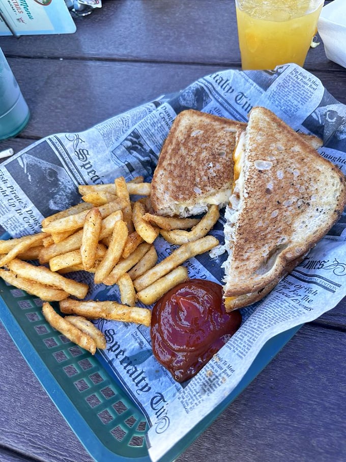 The humble grilled cheese grows up, goes to college, and returns with crab meat and a sophisticated palate. Still loves hanging out with fries though.