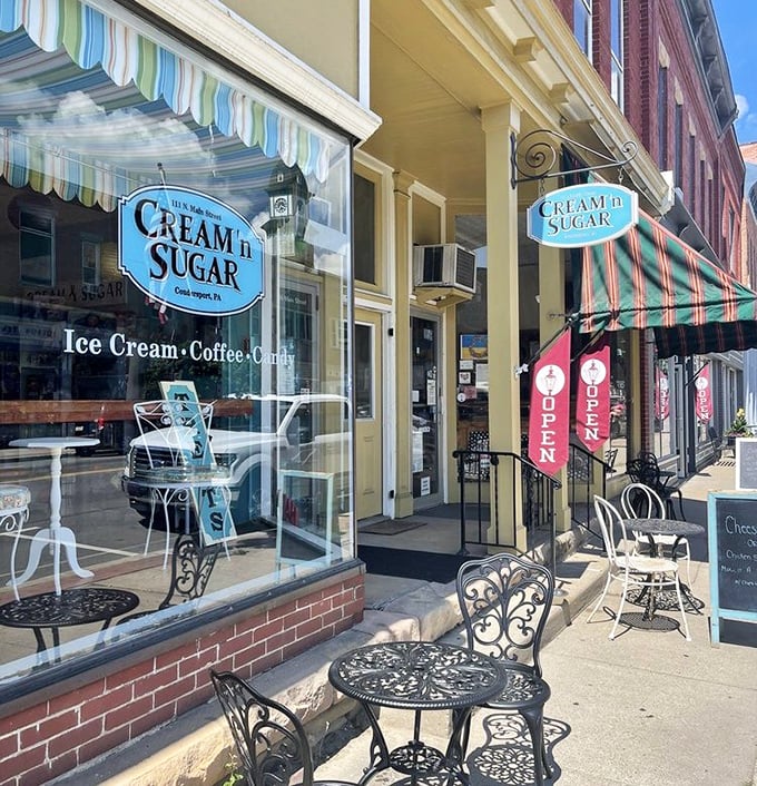 Cream 'n Sugar Caf&eacute;'s sidewalk seating beckons you to slow down, savor something sweet, and remember what conversations were like before texting.