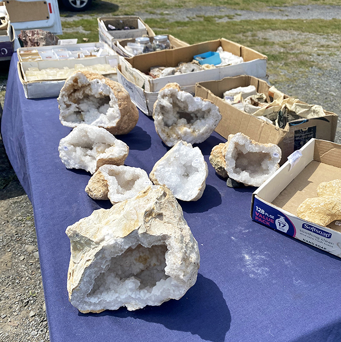 Nature's geodes cracked open like cosmic eggs. These crystal formations reveal the earth's secret bling hidden beneath mundane exteriors.