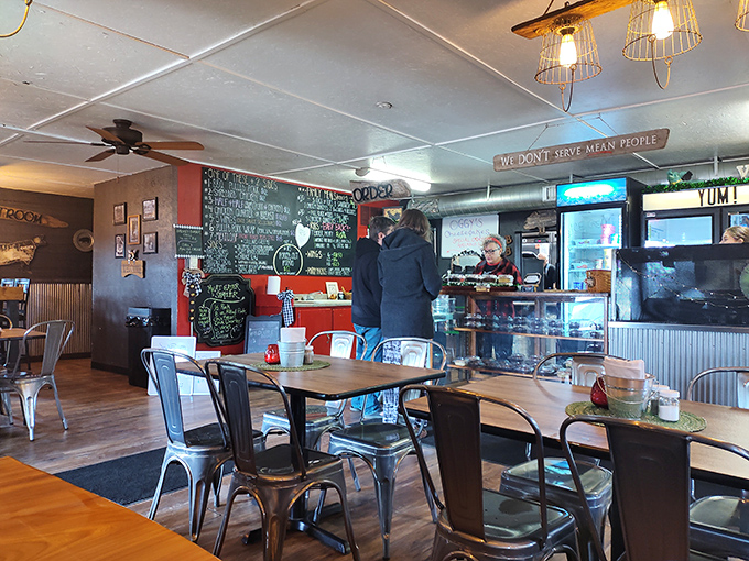 Where BBQ pilgrims come to worship at the altar of smoke and spice. Note the sign above: "We Don't Serve Mean People."