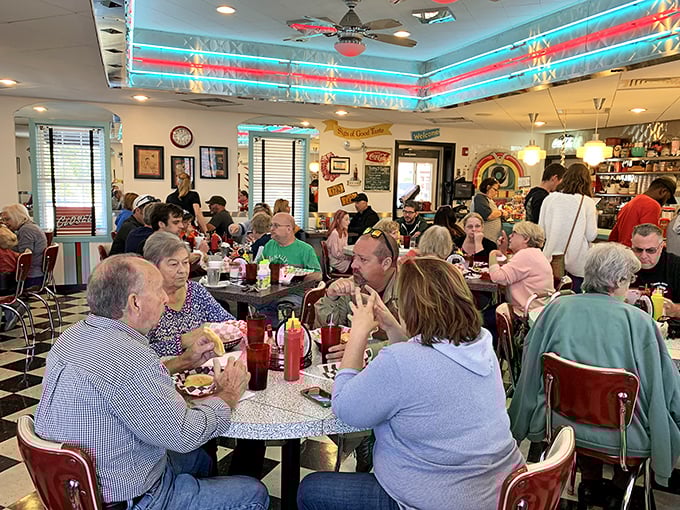 A full house of happy diners proves good taste never goes out of style. Conversations flow as freely as the coffee refills.