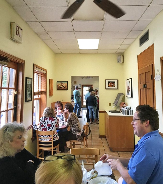 The dining room buzzes with the universal language of food appreciation&mdash;forks diving, conversations flowing, and not a crumb wasted.