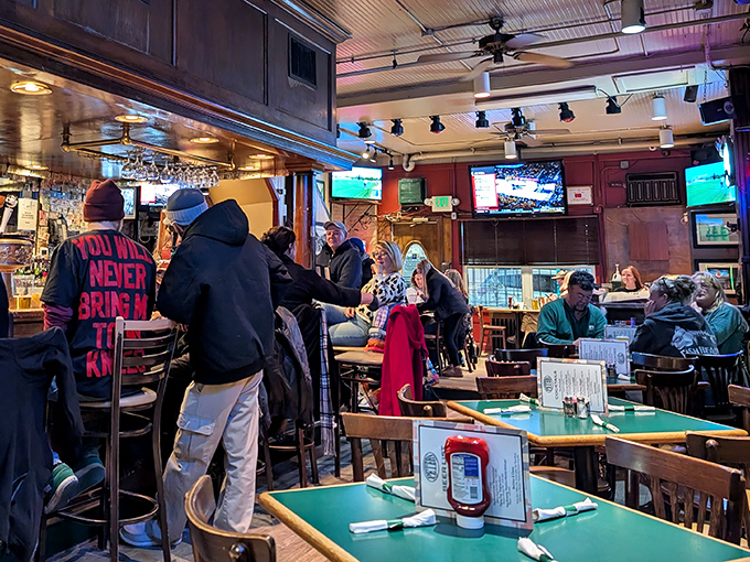Game day brings out the faithful, with multiple screens ensuring you won't miss a play while diving into those famous crab cakes.