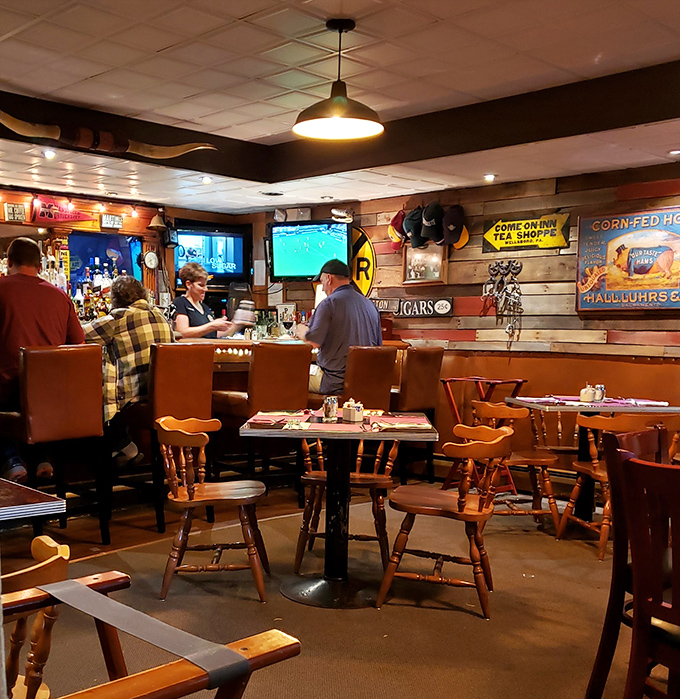 Wooden chairs, rustic tables, and that unmistakable steakhouse energy where memories are made between bites of perfectly cooked beef.
