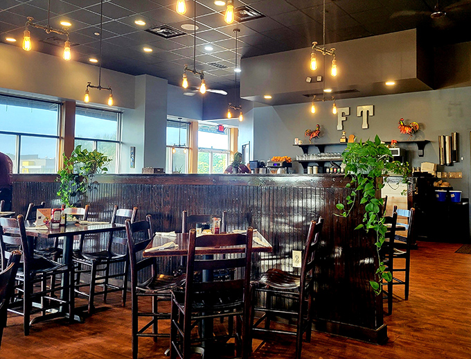 Pendant lighting casts a warm glow over dark wood tables, creating the perfect setting for important decisions like syrup-to-pancake ratios.