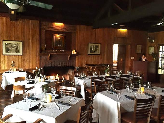 Dining among wood-paneled walls and white tablecloths feels like being invited to a secret club where the password is "excellent taste."