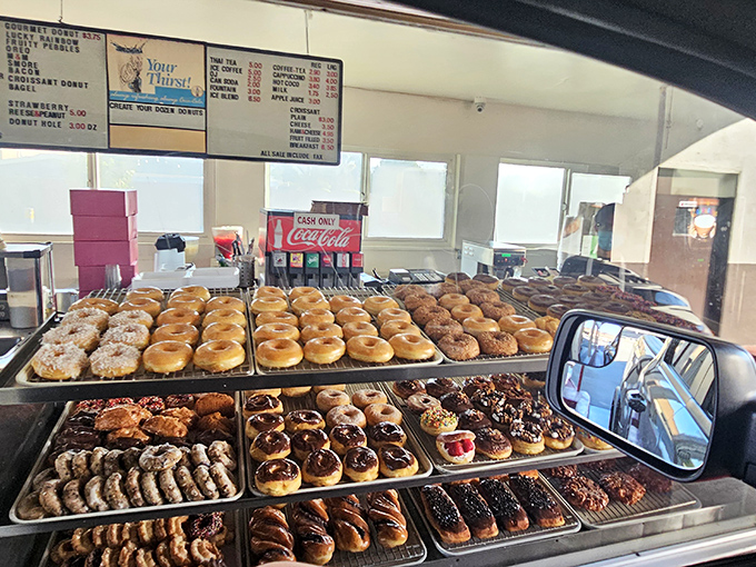 Donut display that makes choosing just one about as possible as picking a favorite Beatles song. Better order a dozen.
