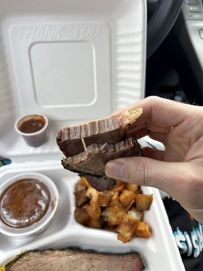 Behold the pink smoke ring&mdash;nature's way of telling you this brisket has been loved, pampered, and perfectly smoked.