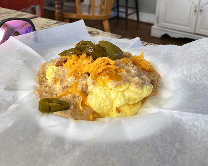 Eggs, sausage gravy, and cheese create a breakfast symphony that Mozart would have composed had he been born in Tennessee.