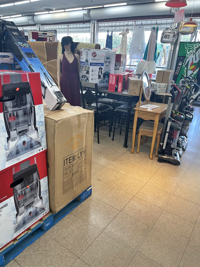The electronics corner: where vacuum cleaners, mannequins, and household appliances gather like misfit toys waiting for their forever homes.