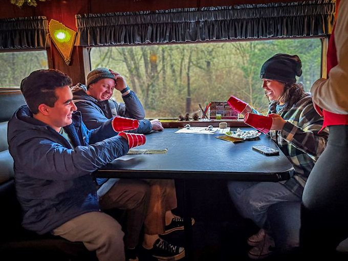 Games and laughter flow as freely as the scenery outside, creating the kind of genuine human connections that make train travel so magically different from other transportation.