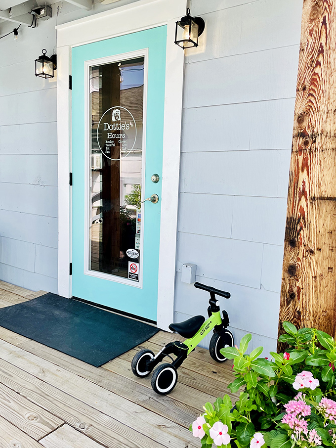 The turquoise door to paradise. Like a portal to a sweeter dimension, Dottie's entrance beckons with promises of cool delights.