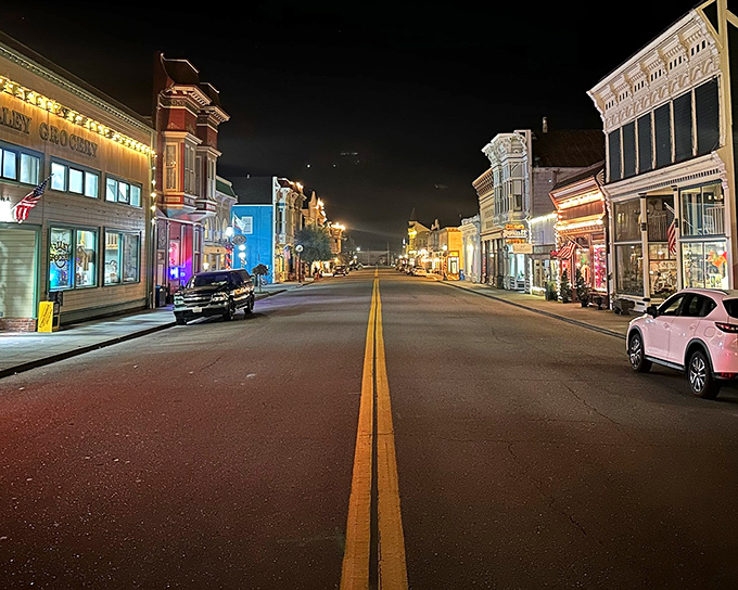 The Victorian Inn's blue facade stands out among its neighbors, like that one relative who dresses a bit fancier for the family reunion.