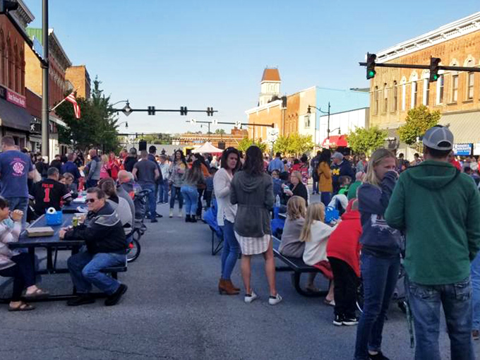 Street festivals transform downtown into the world's most welcoming block party, where strangers become neighbors over shared tables and local fare.