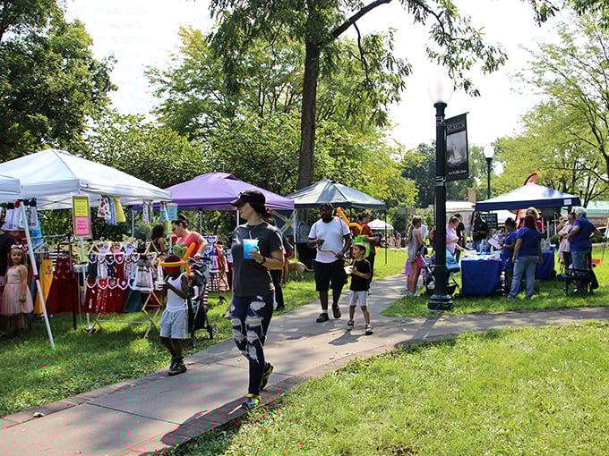 Local festivals transform parks into vibrant marketplaces where community connections are made over handcrafted goods and homemade treats.
