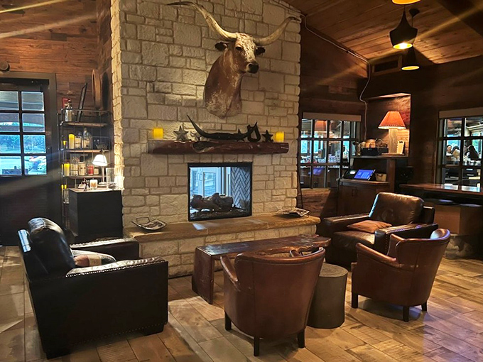 The stone fireplace crowned with longhorns creates the perfect Texas tableau&mdash;like a Ralph Lauren ad come deliciously to life.