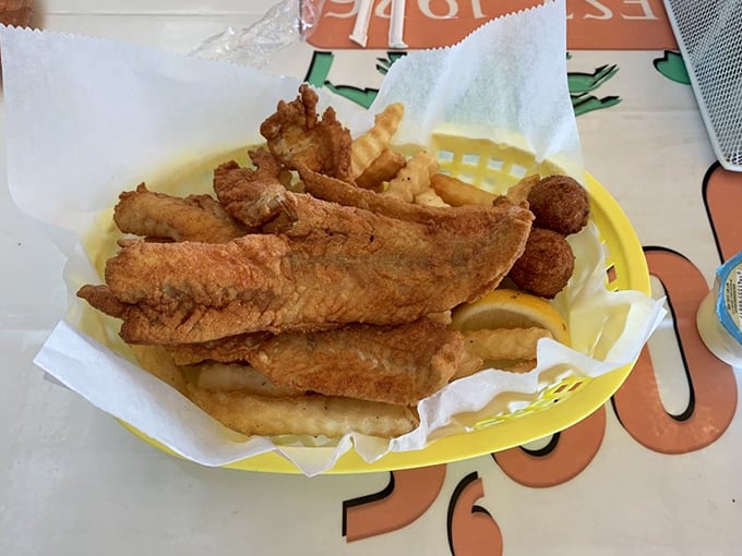Fish so fresh it practically jumps onto your plate. Golden fillets nestled alongside fries &ndash; simple perfection that needs no elaborate explanation.