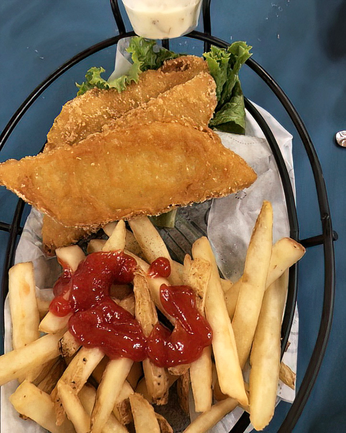 Beer-battered fish so crispy it practically shatters, served with hand-cut fries and a dollop of tartar sauce. Seafood, farm-style.