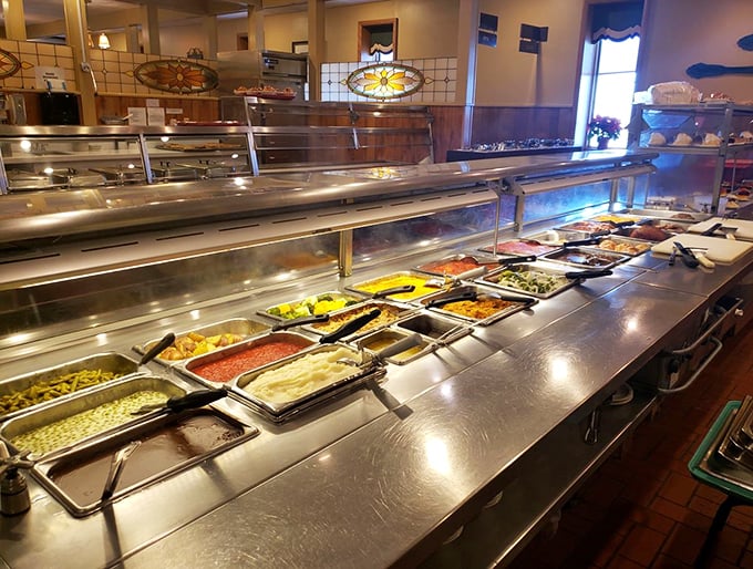 The cafeteria line stretches like a buffet of dreams, each steam tray holding another reason to loosen your belt.