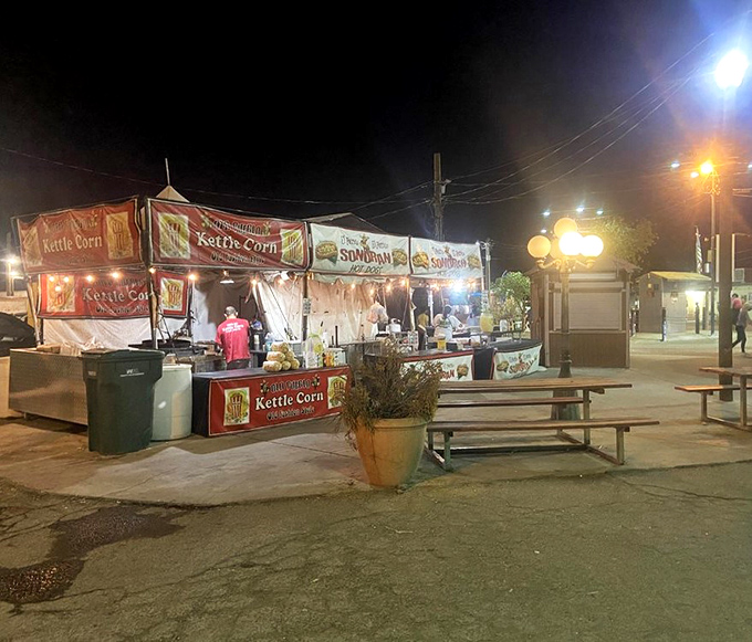 The kettle corn vendors work their magic after dark, filling the night air with a sweet-salty aroma that's impossible to resist.