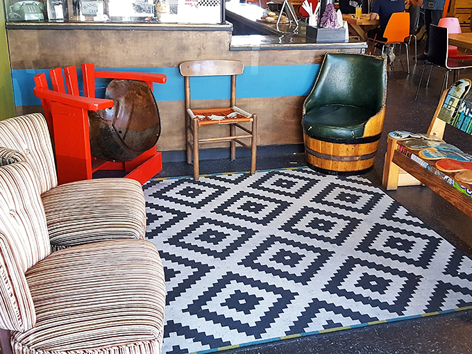 The eclectic lounge area feels like the coolest living room you've ever visited, complete with mismatched furniture that somehow works perfectly together.