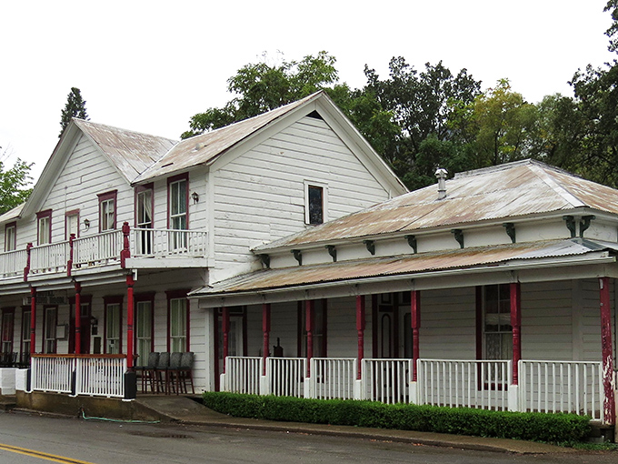 The French Gulch Hotel's white clapboard and red trim stand as a living postcard from California's Gold Rush era, still welcoming weary travelers.