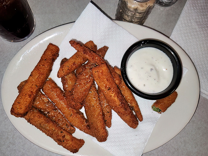 Golden-fried zucchini sticks with ranch dressing&mdash;proof that vegetables can be both virtuous and deliciously sinful at the same time.
