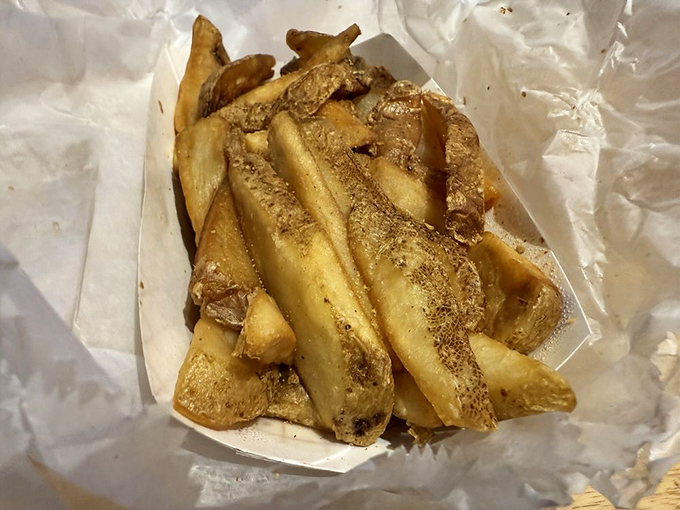 These aren't just fries; they're golden, seasoned potato treasures that make you wonder why they're called "sides" when they deserve center stage.