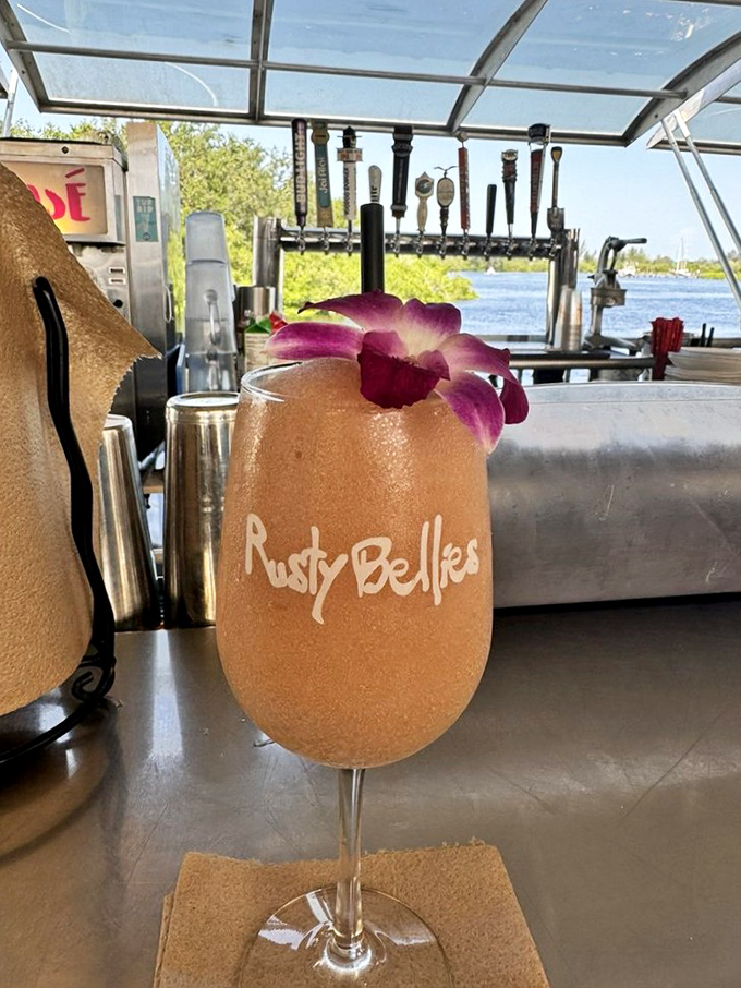 Florida in a glass&mdash;a frosty, tropical concoction garnished with an orchid that says "vacation" even if you're just on lunch break.