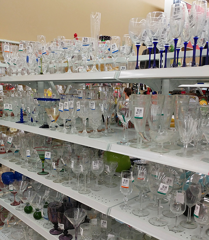 Crystal stemware that once toasted anniversaries and job promotions now sparkles under fluorescent lights, awaiting its next celebration.