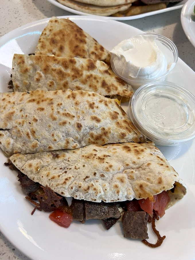 A quesadilla that took a detour through Athens &ndash; Mediterranean meets Mexican in this cross-cultural flavor festival.