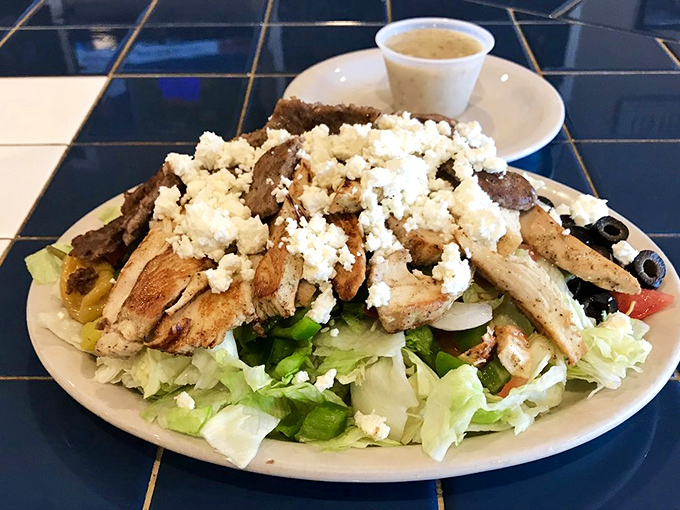 A Greek salad that brings Mediterranean sunshine to Ohio, topped with grilled chicken and enough feta to make Zeus himself smile.