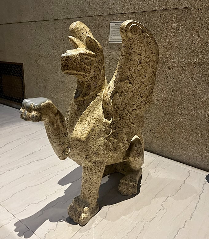 Not your average yard ornament. This mythological creature stands guard, looking like it might take flight if you blink too long.