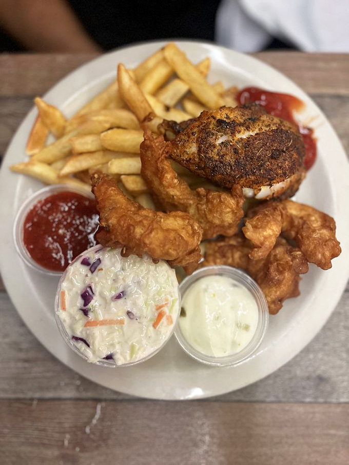 A platter that can't decide between fried grouper, shrimp, or both&mdash;so you get the pleasure of not choosing. The coleslaw looks particularly smug.