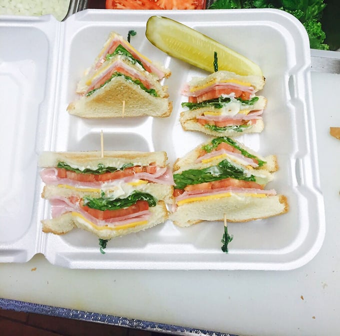 Club sandwiches: the architectural marvels of lunch cuisine, where each precisely cut triangle reveals layers of ingredients working in perfect harmony.