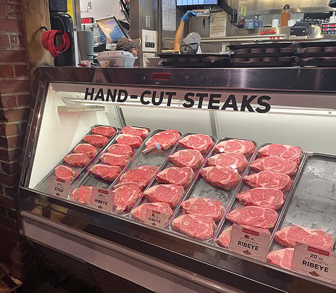 The meat case isn't just a display—it's a promise. Those hand-cut steaks wait patiently for their moment of flame-kissed glory.