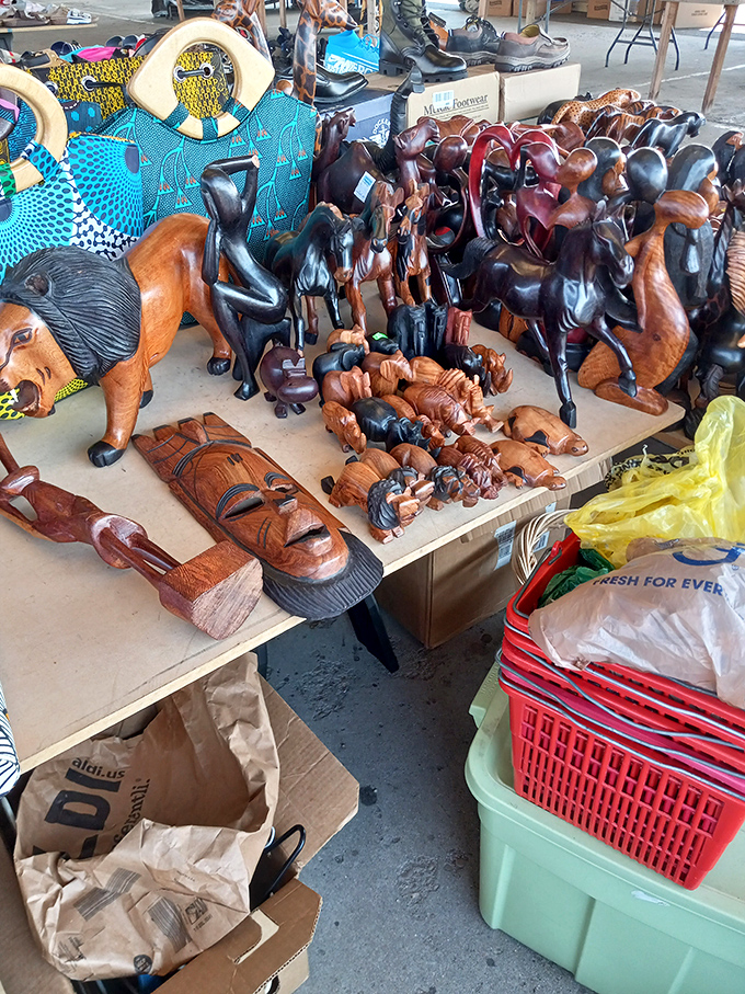 Carved wooden animals stand in silent formation, each telling stories of distant lands and artisan hands. Functional art meets cultural expression.