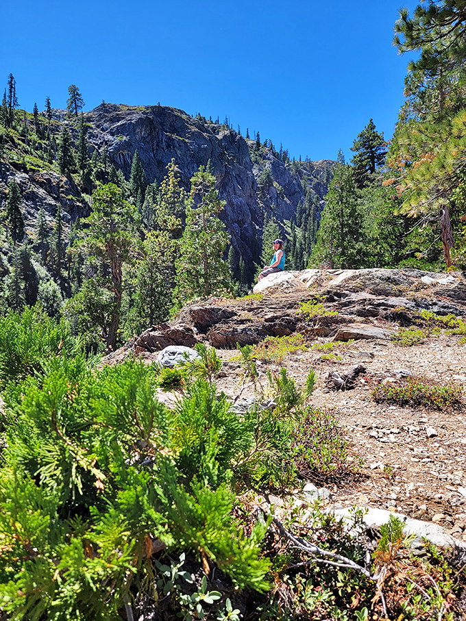 Perched on nature's balcony, contemplating life's big questions. Like, "How did I go this long without discovering this place?"