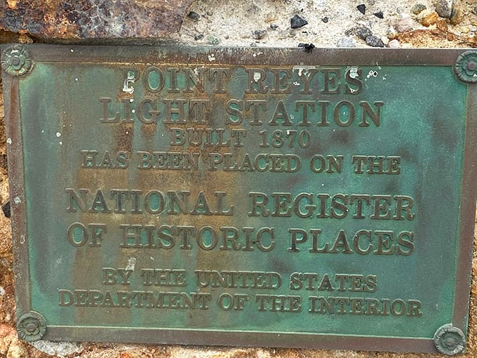 A weathered plaque tells the lighthouse's official story, but the real tales are written in the logbooks of ships it saved from disaster.