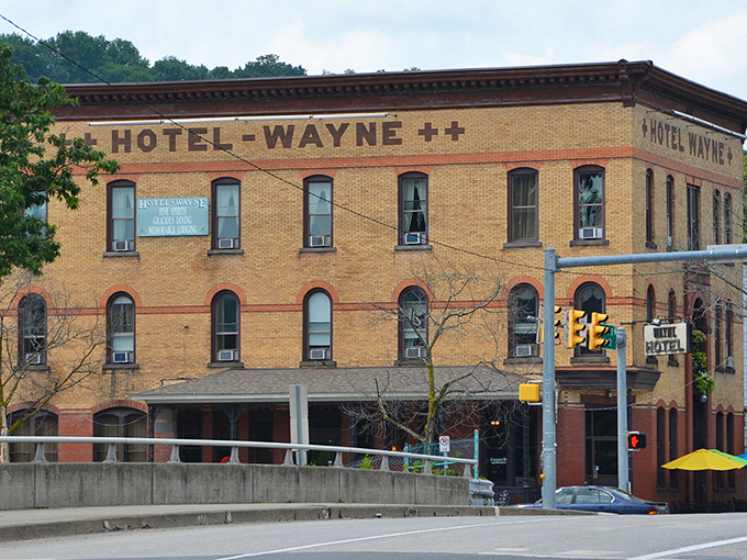 Hotel Wayne stands as a brick sentinel of hospitality, offering weary travelers the same welcome it has for generations.