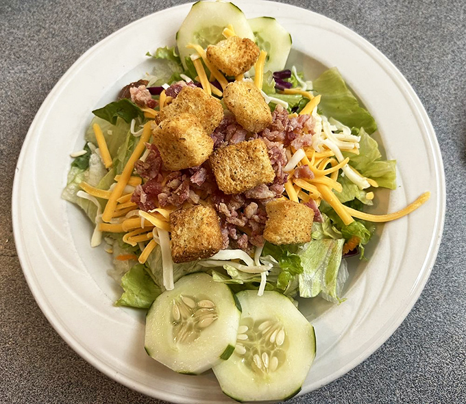 This isn't just a salad&mdash;it's a colorful garden party topped with cheese, croutons, and the promise that healthy choices can still be delicious.