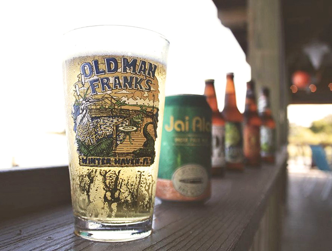 Cold beer in a branded glass with water views&mdash;basically the Florida equivalent of winning the relaxation lottery.