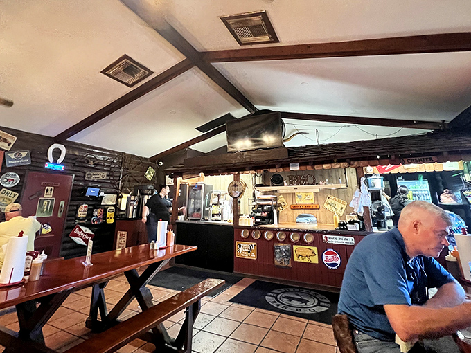 The dining room feels like your favorite uncle's cabin&mdash;if your uncle happened to be a barbecue genius with a penchant for picnic tables.