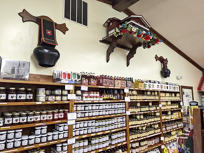 Jars of possibility line these wooden shelves. Each contains a story of tradition, preservation, and flavors waiting to grace your table.