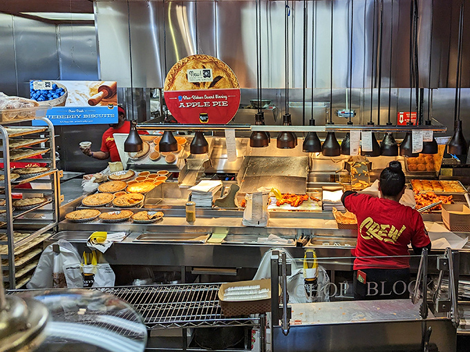 Behind-the-scenes magic where kettle fried dreams come true. Even the pies get the star treatment in this kitchen choreography of comfort food creation.