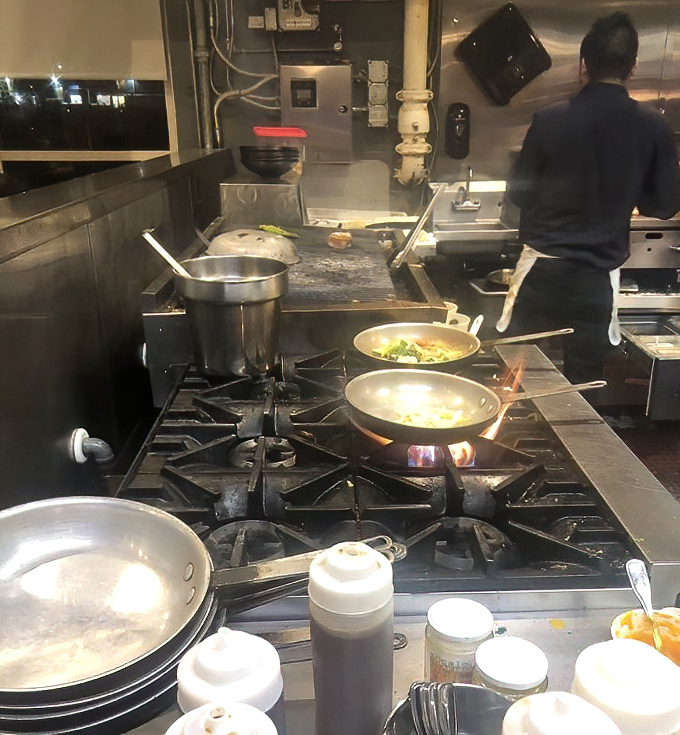 Where the magic happens&mdash;no smoke, mirrors, or microwaves. Just skilled hands transforming the morning's catch into the evening's memories.