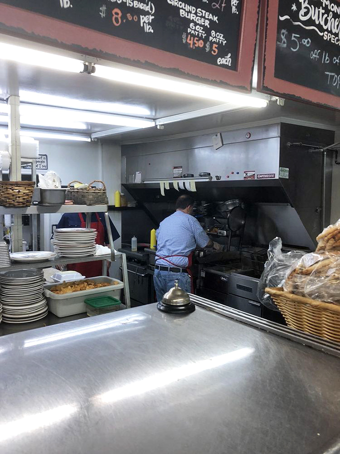 Where the magic happens. No fancy equipment, just skilled hands and decades of know-how turning simple ingredients into extraordinary meals.