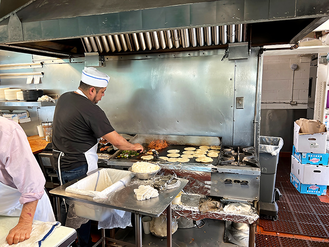 Watch as skilled hands transform simple ingredients into extraordinary meals. This open kitchen has nothing to hide and everything to showcase.