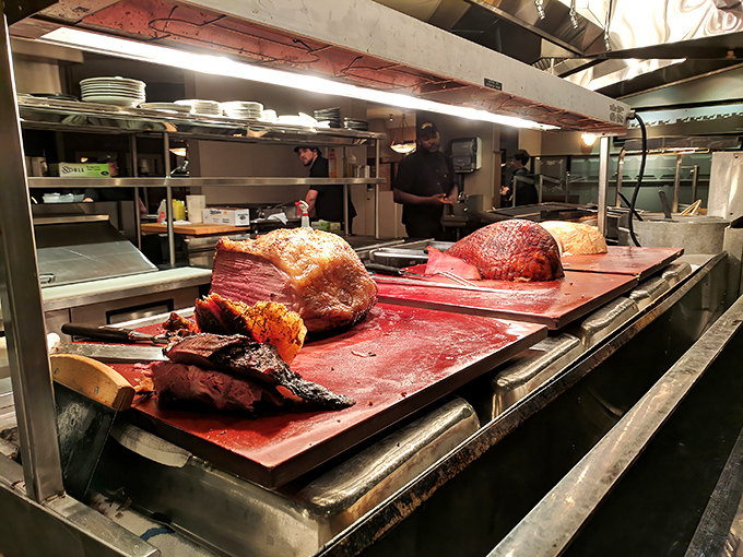 Meat masterpieces awaiting their destiny. The carving station is where dreams are sliced into reality. 